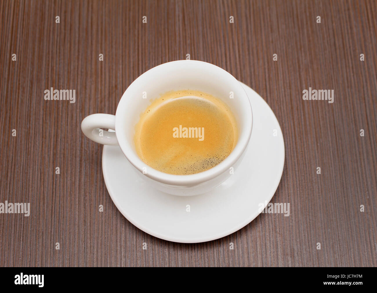 Traditional Italian espresso coffee in white cup Stock Photo - Alamy