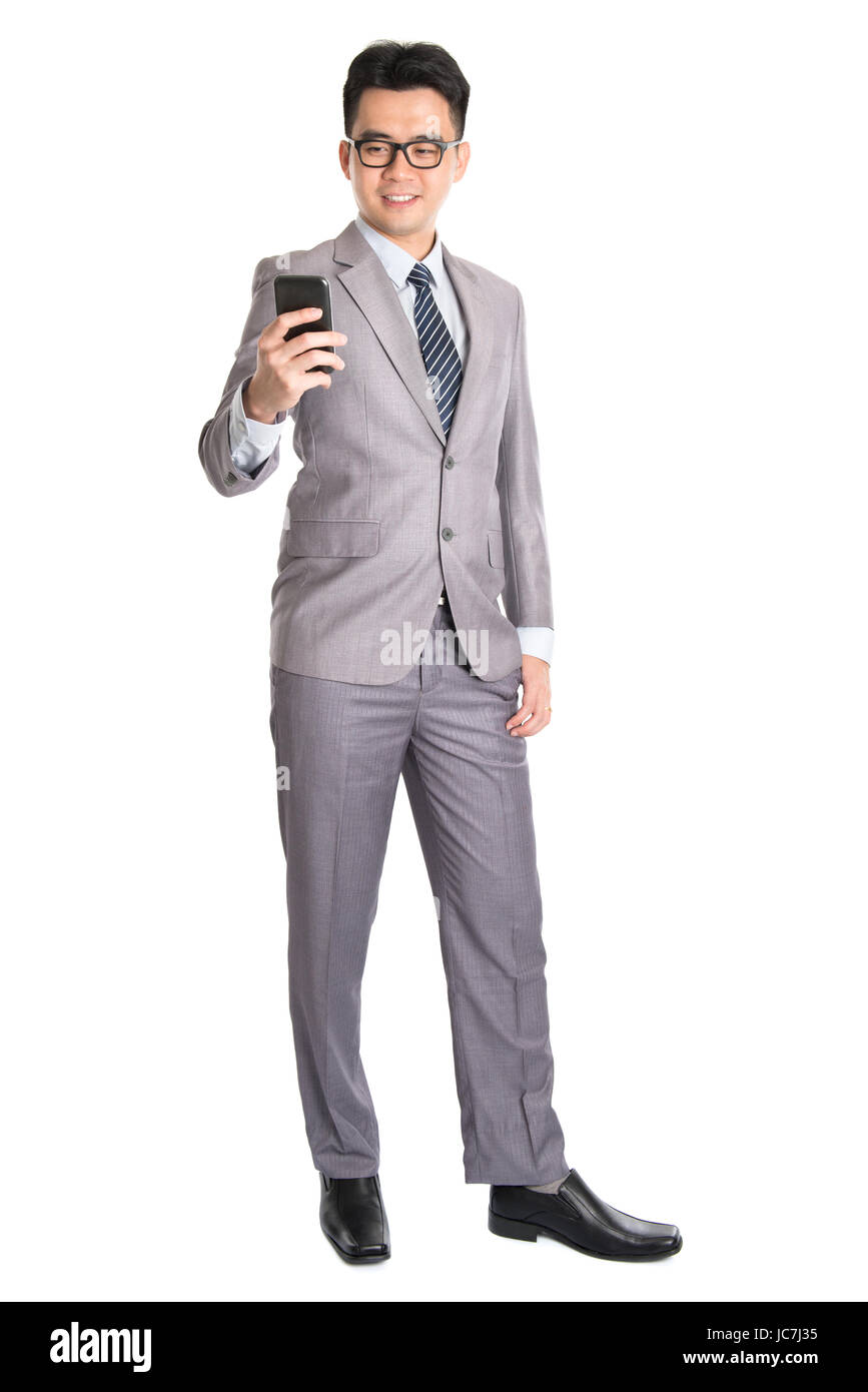 Young adult browsing on phone Cut Out Stock Images & Pictures - Alamy