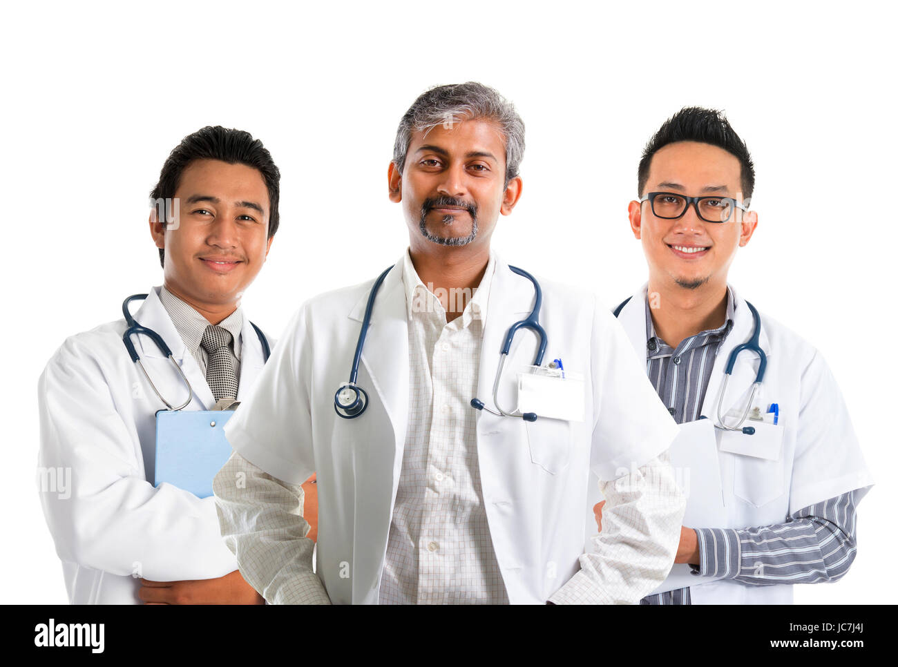 Multiracial doctors / diverse medical team standing isolated on white ...