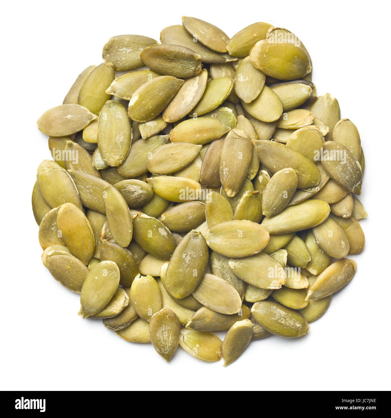 pumkin seeds on white background Stock Photo - Alamy