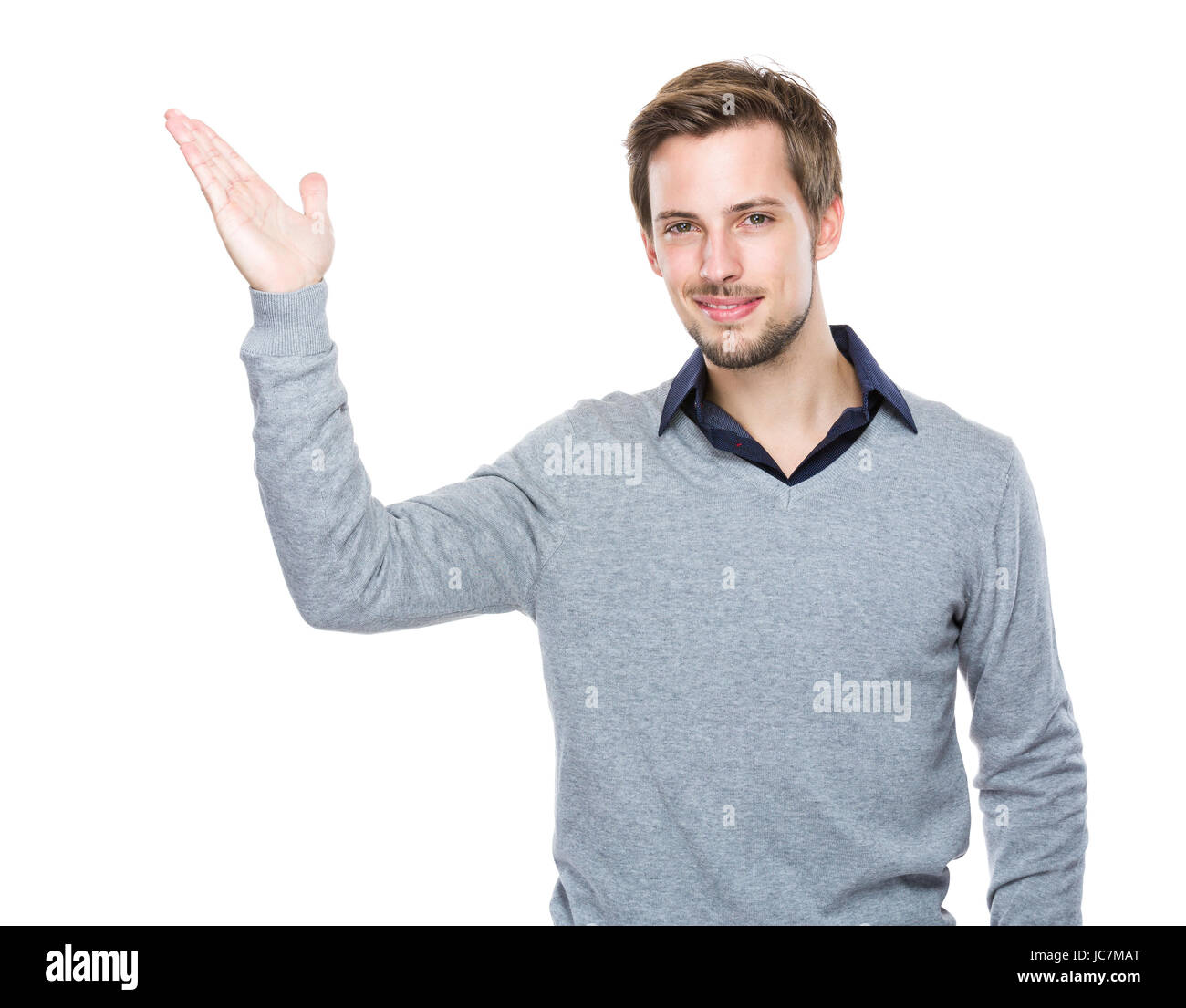 Man with hand presentation Stock Photo - Alamy