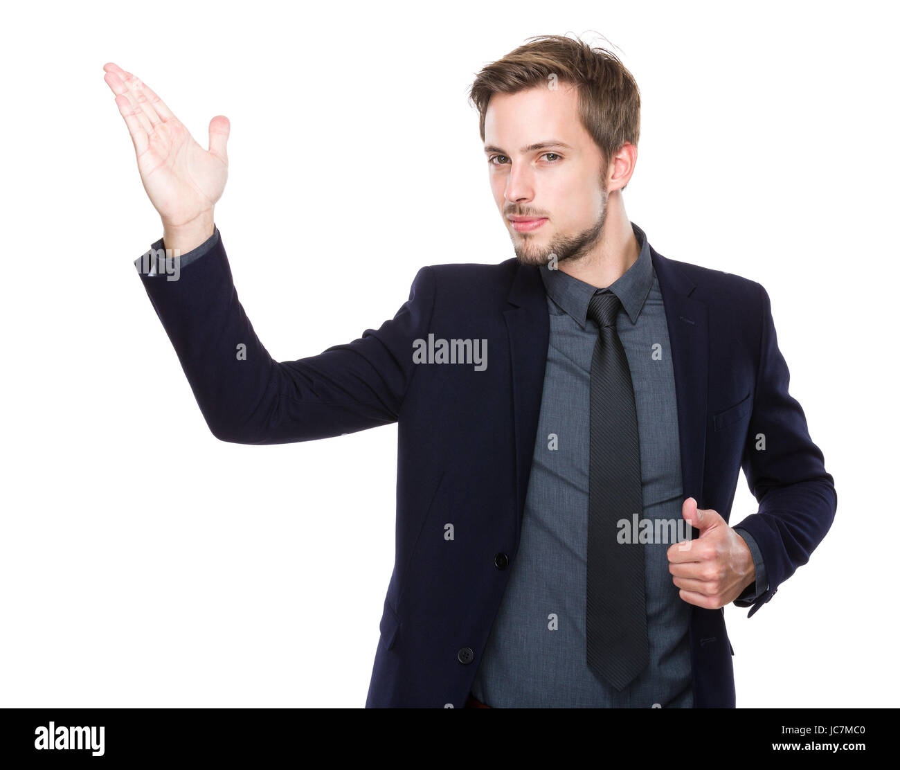 Caucasian businessman with hand presentation Stock Photo - Alamy