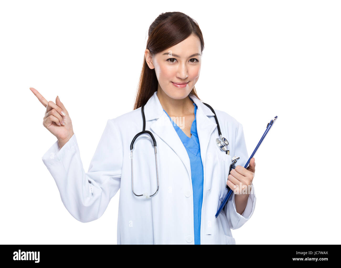 Female doctor finger point up with clipboard Stock Photo - Alamy