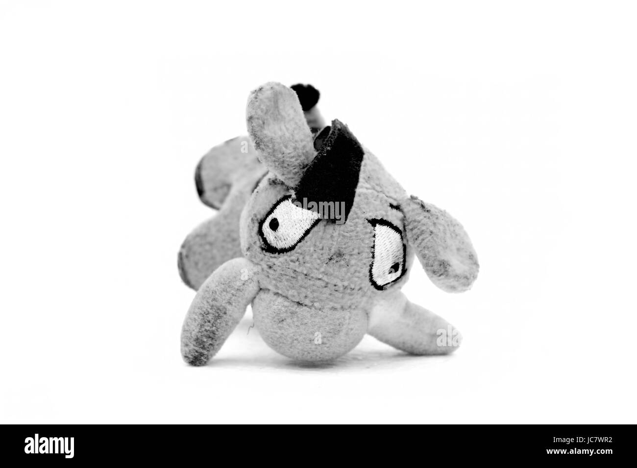 Hand made kids toy and its reflection isolated on white. less is more ...
