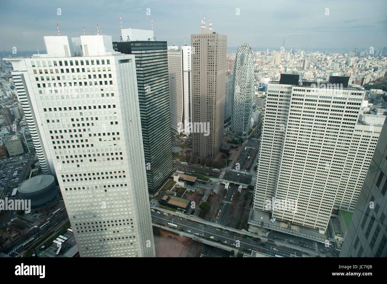 City Overview of Shinjuku, Tokyo, Japan with Skyscrapers and Cloudy Sky ...