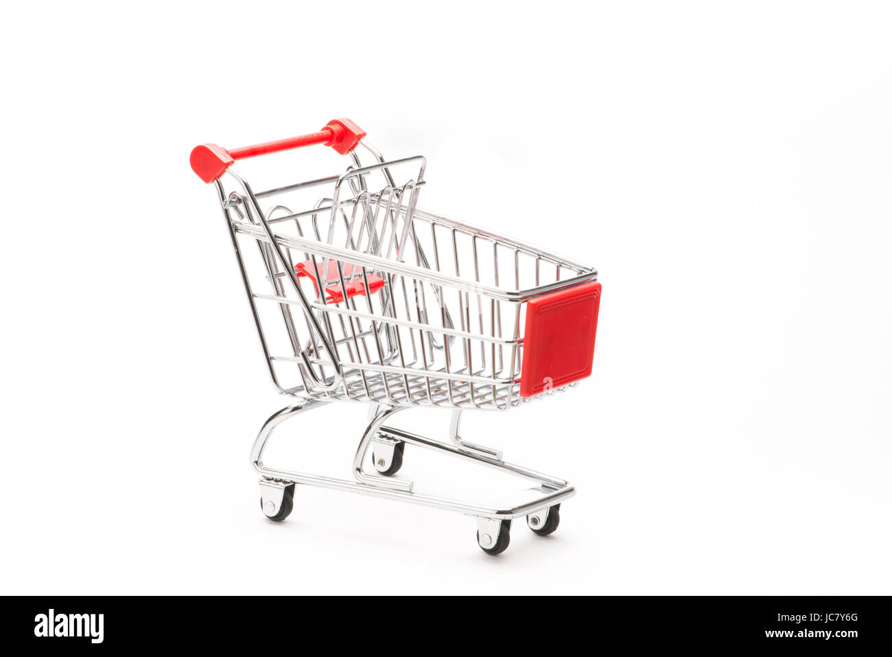 Shopping's caddy on white background Stock Photo - Alamy
