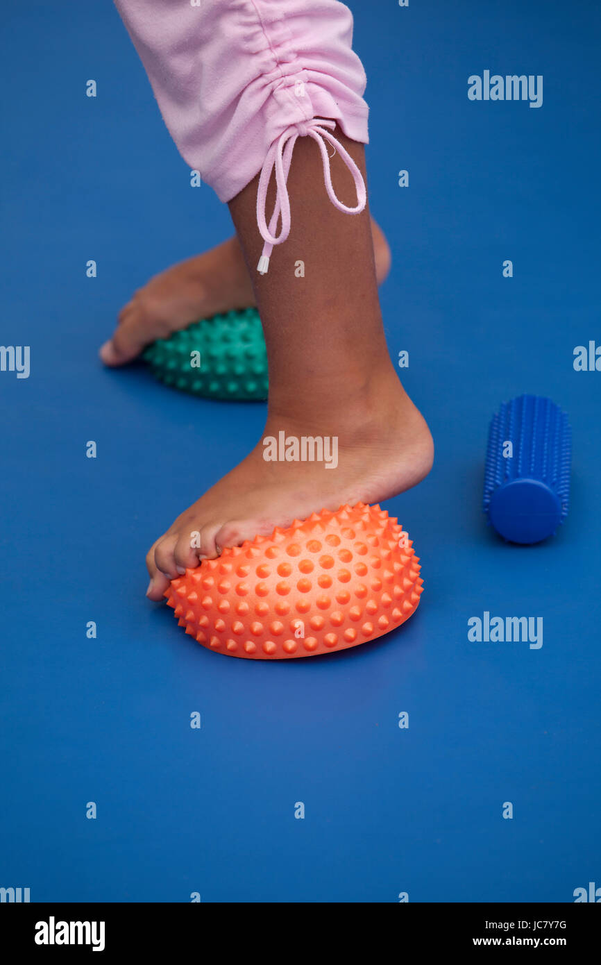 Massaging feet ball hi-res stock photography and images - Alamy