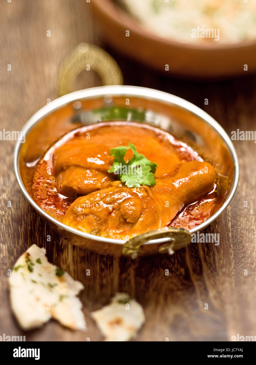 close up of a bowl of rustic indian chicken curry Stock Photo - Alamy