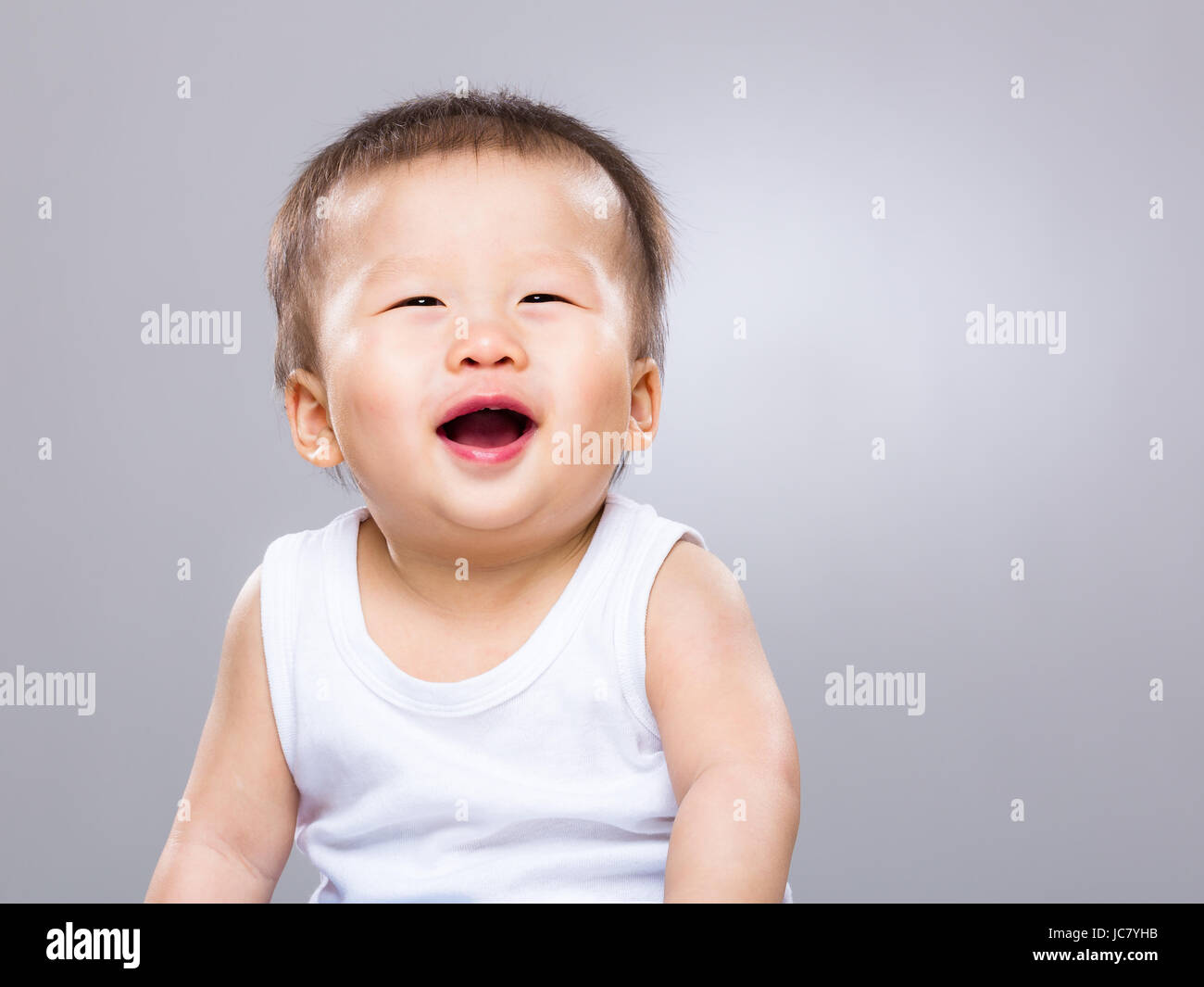 Excited baby boy Stock Photo - Alamy