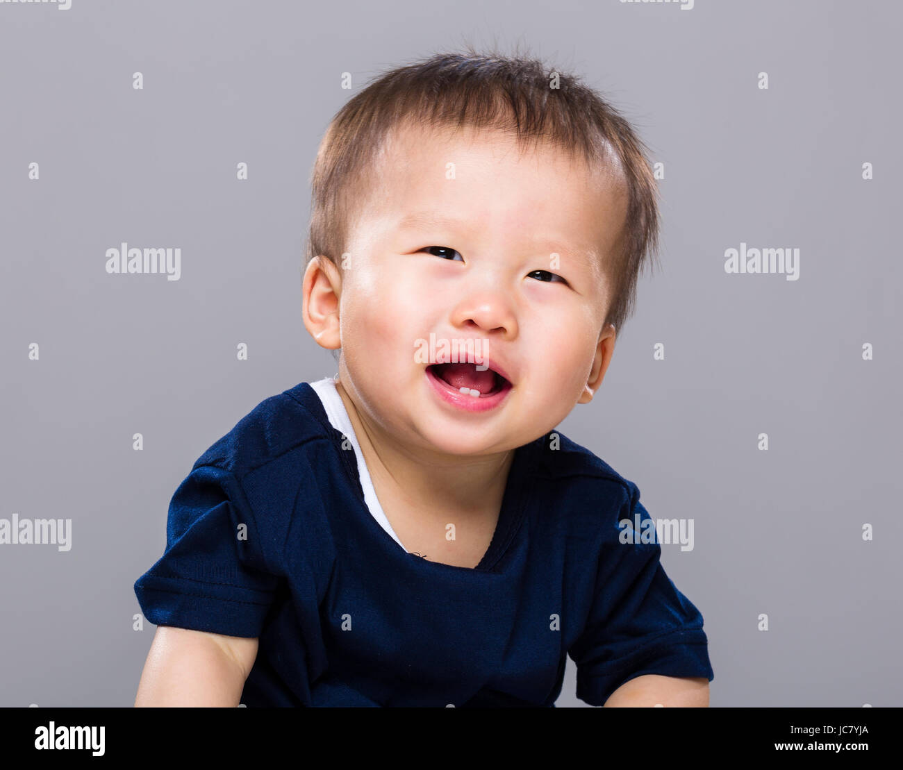 Baby boy giggle Stock Photo - Alamy