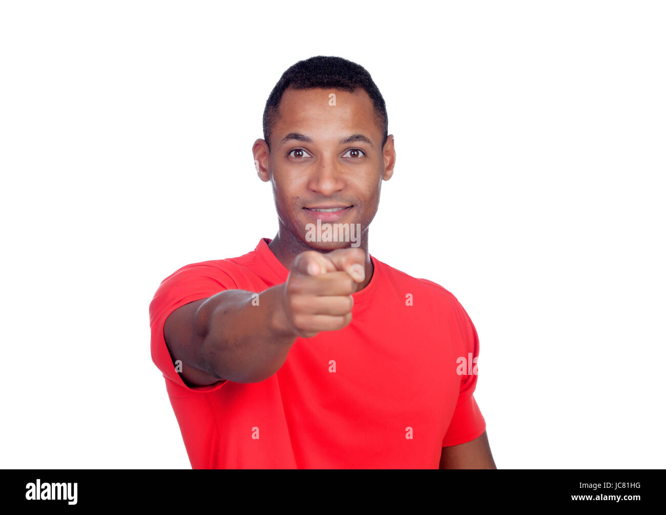 Latin American casual man pointing at the camera with finger isolated ...