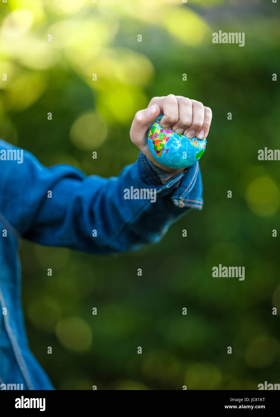 Squeezing earth hi-res stock photography and images - Alamy