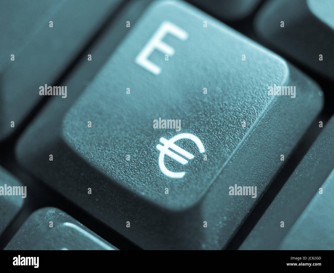 Detail of keys on a computer keyboard - cool cyanotype Stock Photo - Alamy