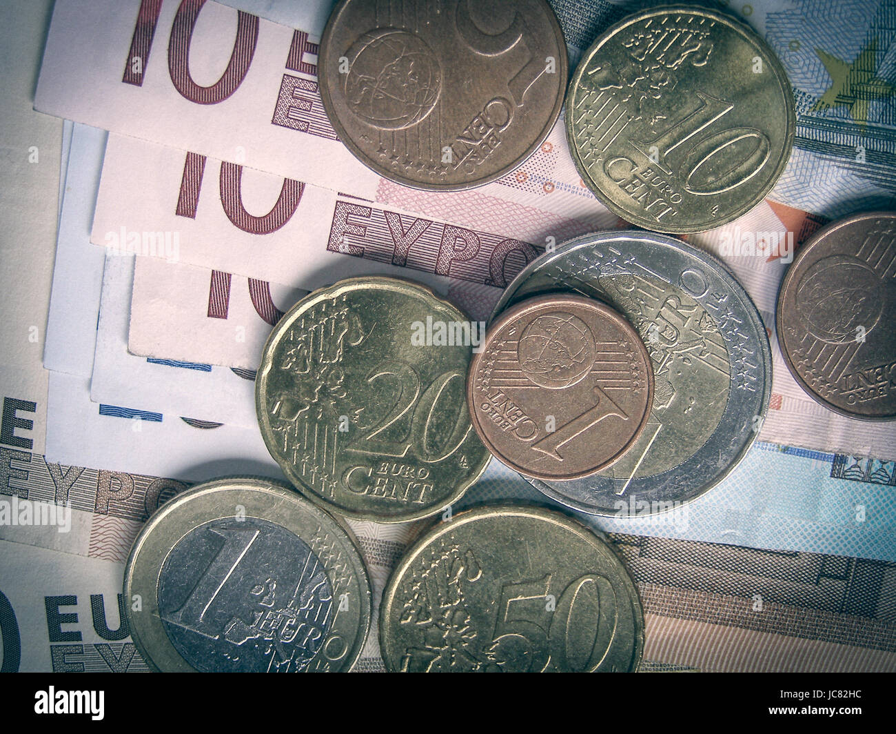 Vintage looking Euro banknotes and coins picture Stock Photo - Alamy