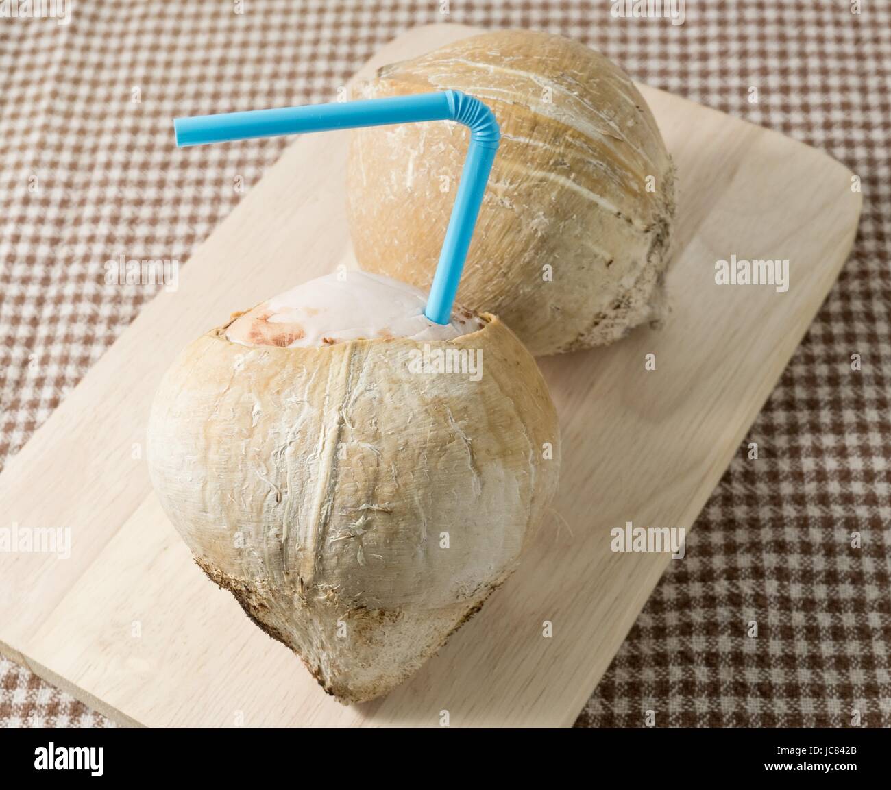 Fresh Fruits, Two Sweet Coconut with Drinking Straw on Wooden Board ...