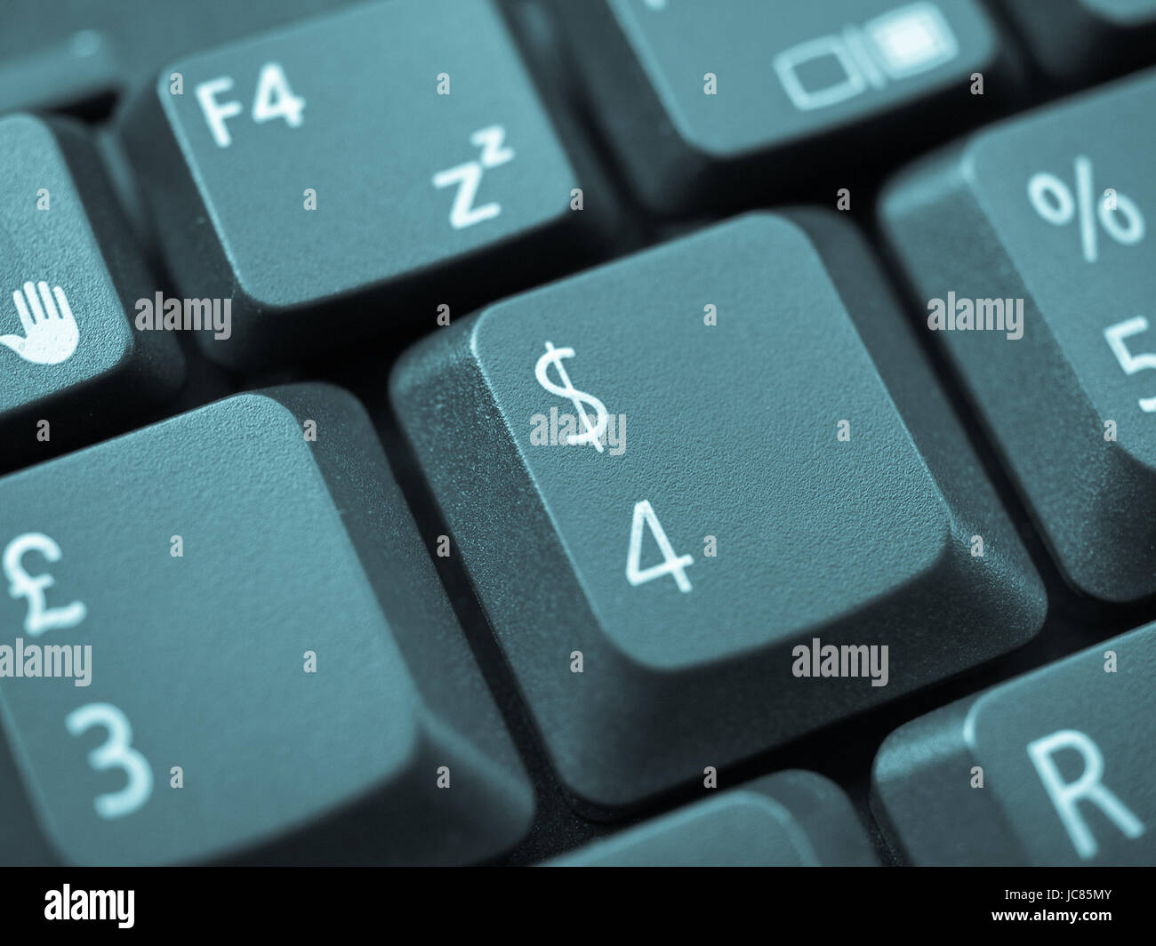 Detail of keys on a computer keyboard - cool cyanotype Stock Photo - Alamy