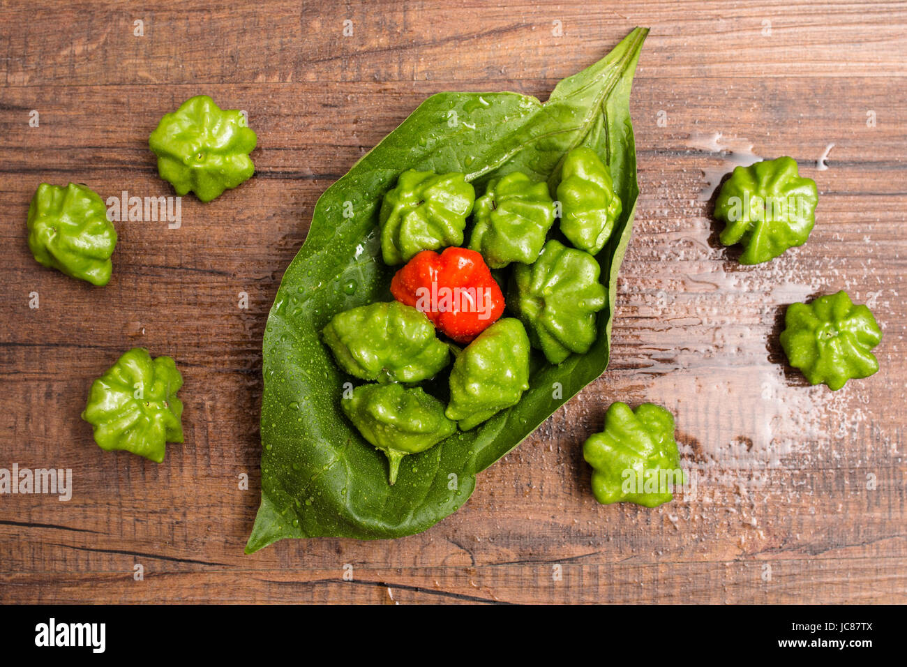 chili peppers on a sheet Stock Photo - Alamy