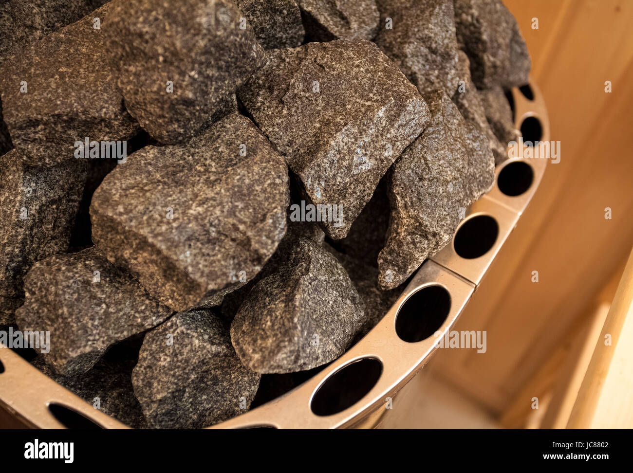 Closeup photo of granite stones at sauna Stock Photo - Alamy
