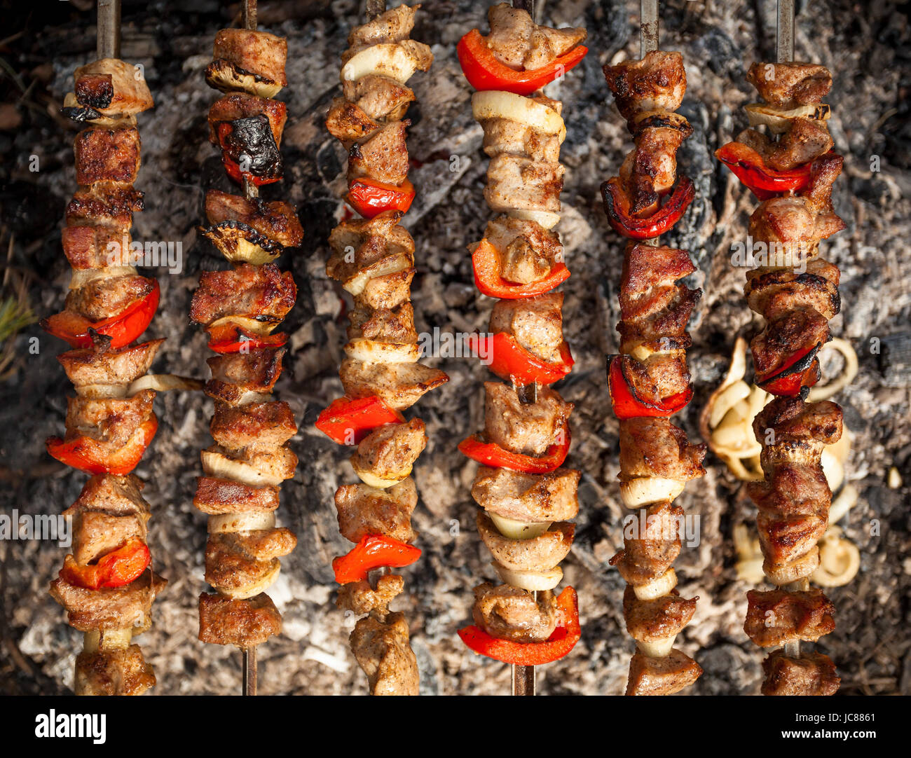 Closeup photo of kebab being cooked on fire Stock Photo - Alamy
