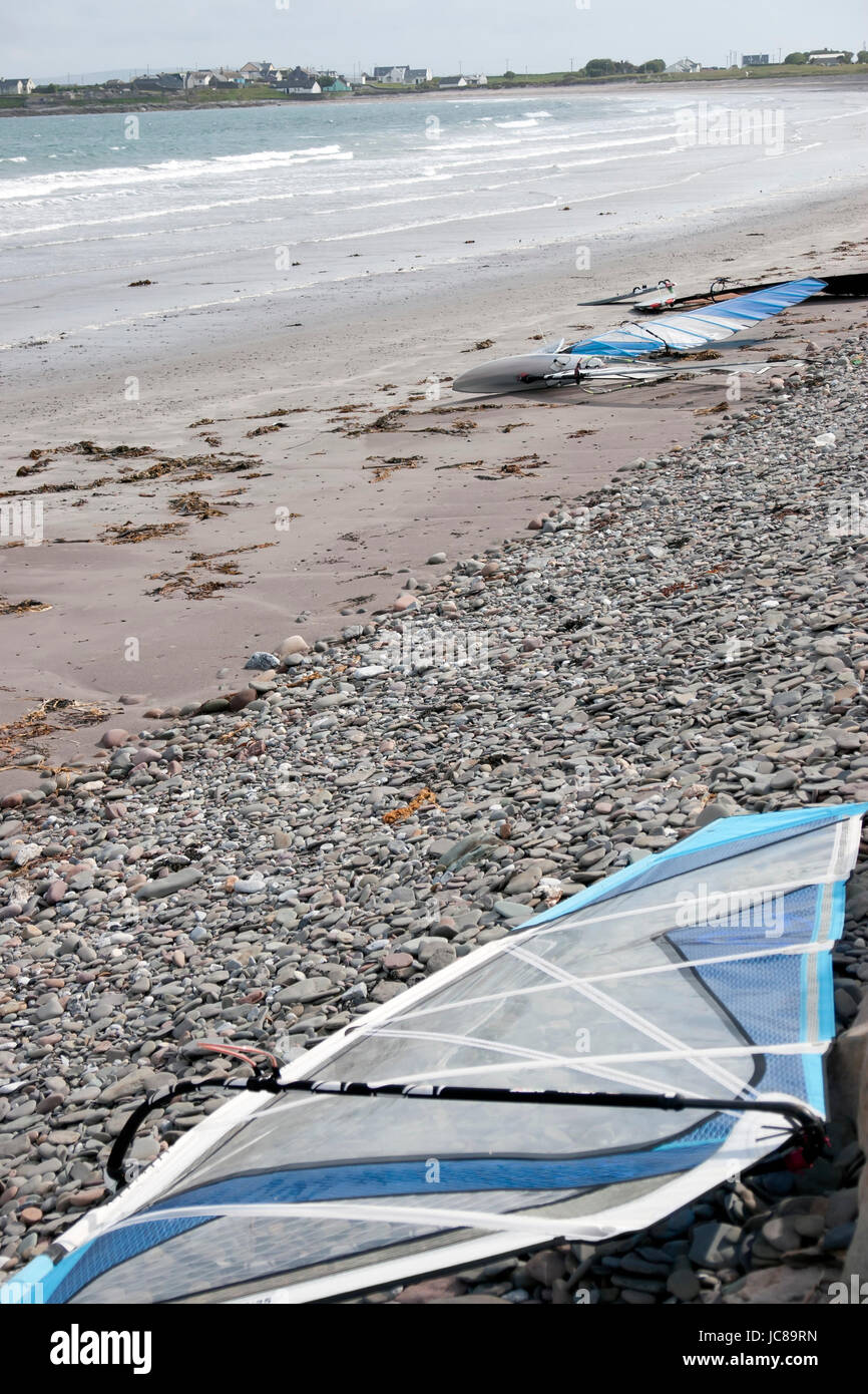 windsurfers surfboards on the beach in the maharees county kerry ...