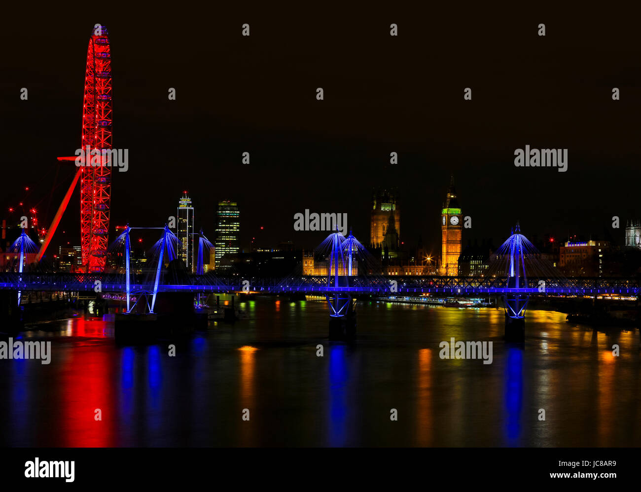 night shot of river thames showing all illuminations and new buildings ...