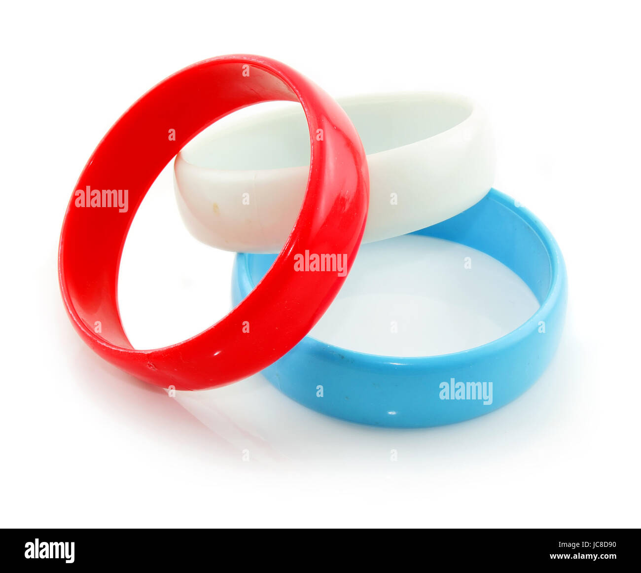 Three colored plastic bracelets isolated on a white background Stock ...