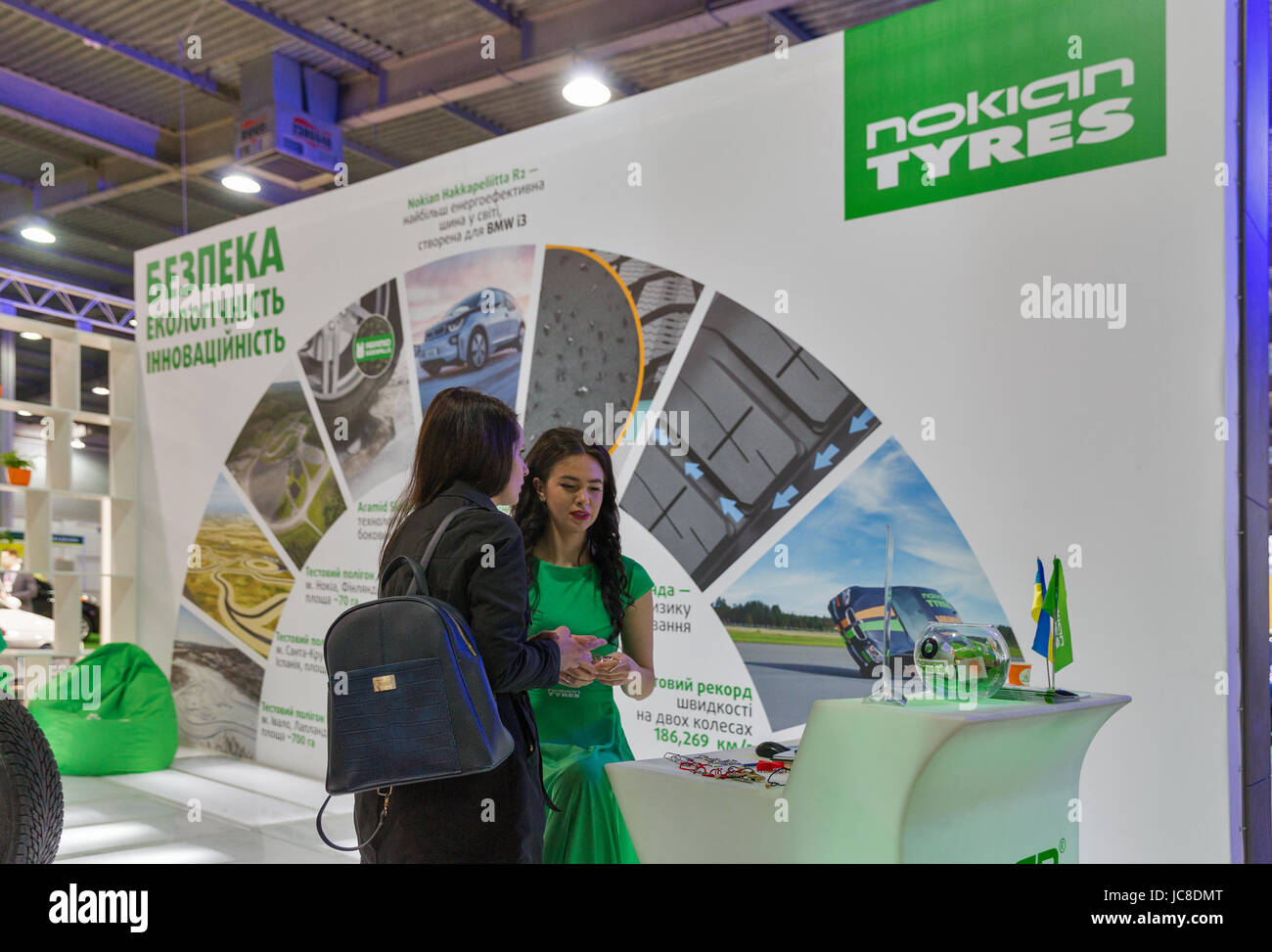 KIEV, UKRAINE - APRIL 07, 2017: People visit Nokian car tyres booth at ...
