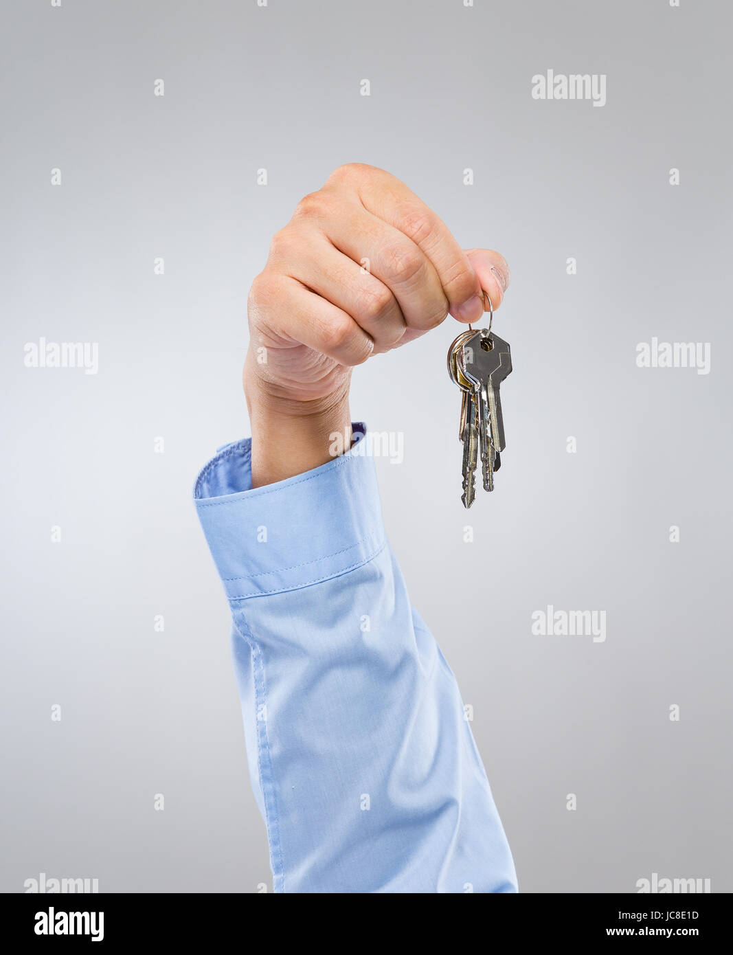 Man hold with key chain Stock Photo - Alamy