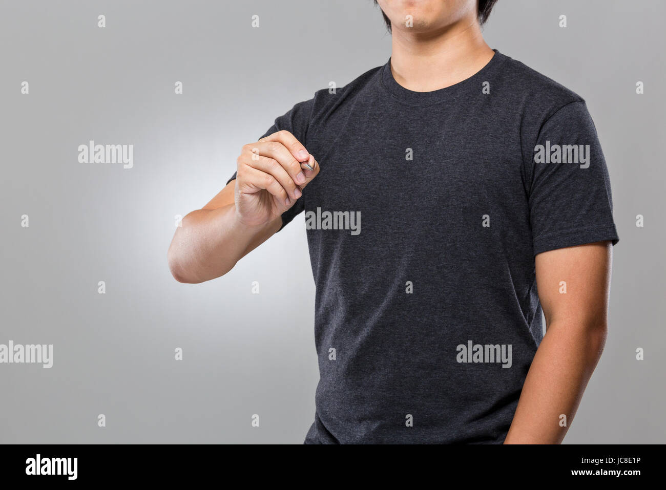 Man write on imaginary panel Stock Photo - Alamy