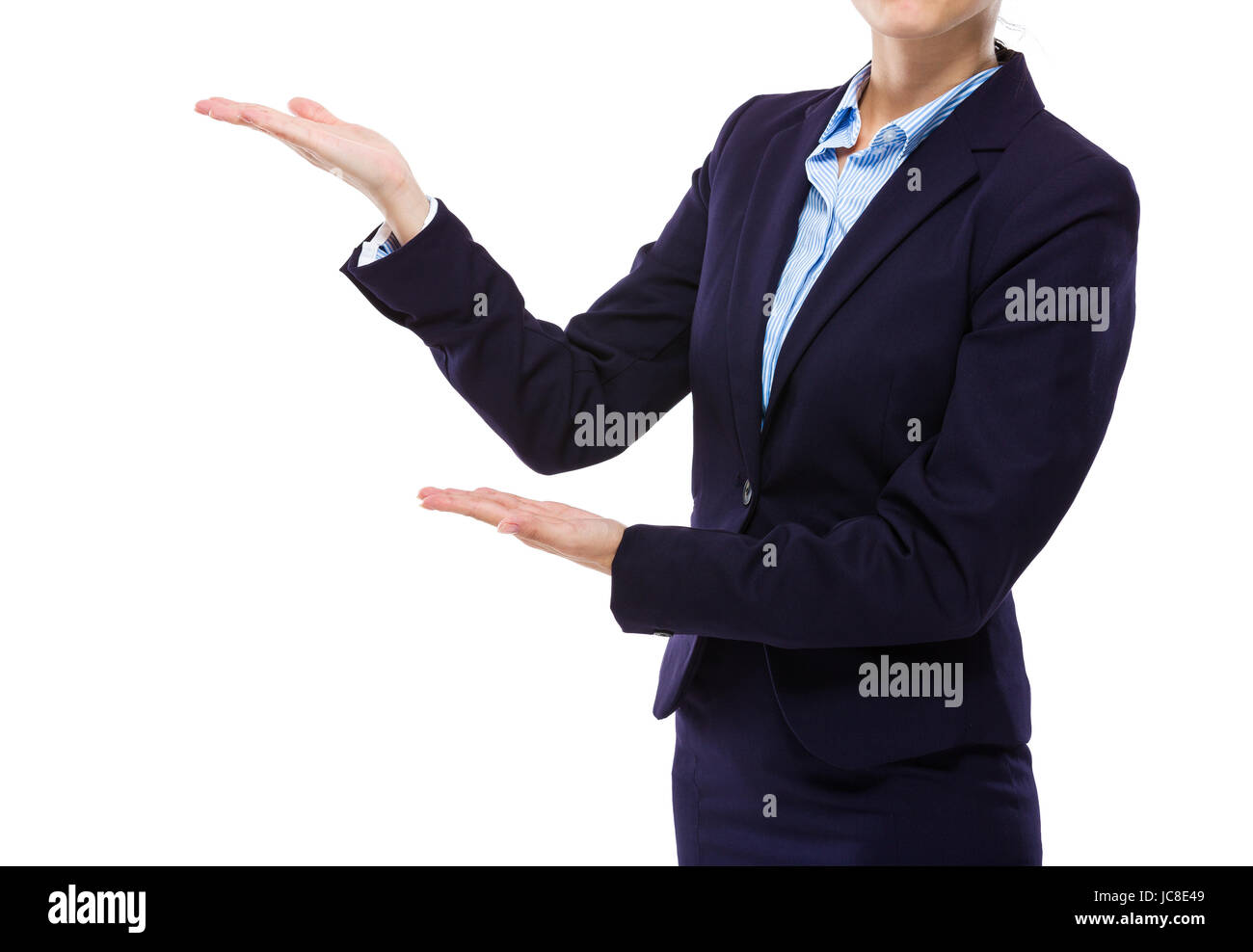 Businesswoman with two hand presentation Stock Photo - Alamy