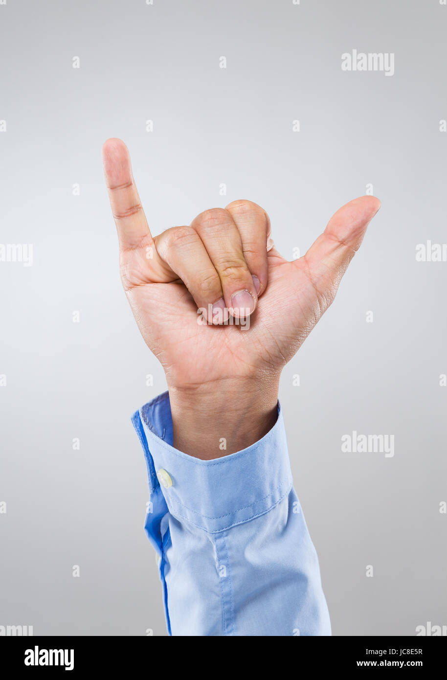 Businessman hand gesture show number six Stock Photo - Alamy
