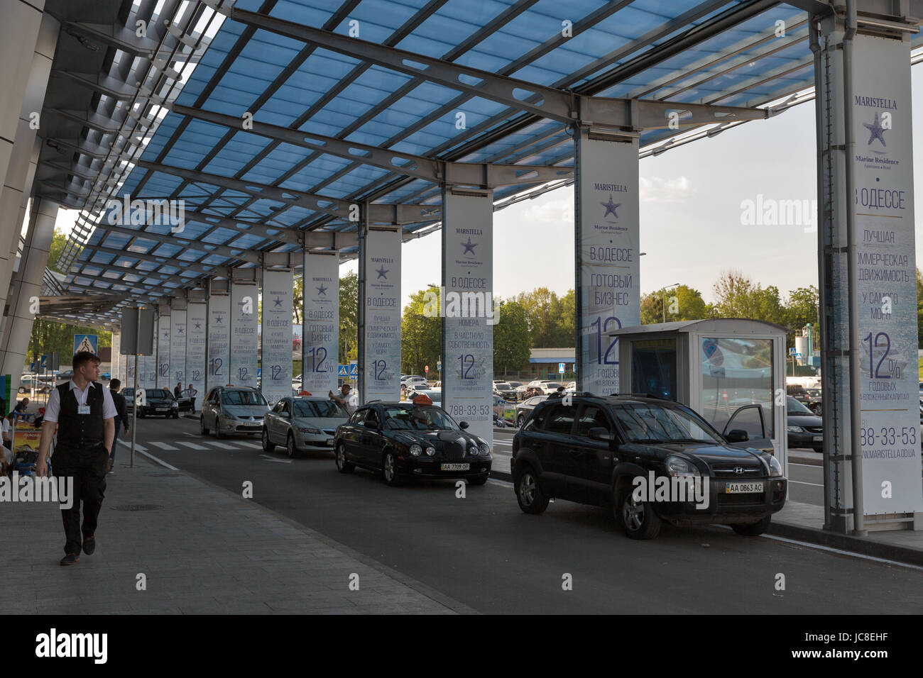 KIEV, UKRAINE - MAY 07, 2017: Taxi parked in front of Igor Sikorsky ...