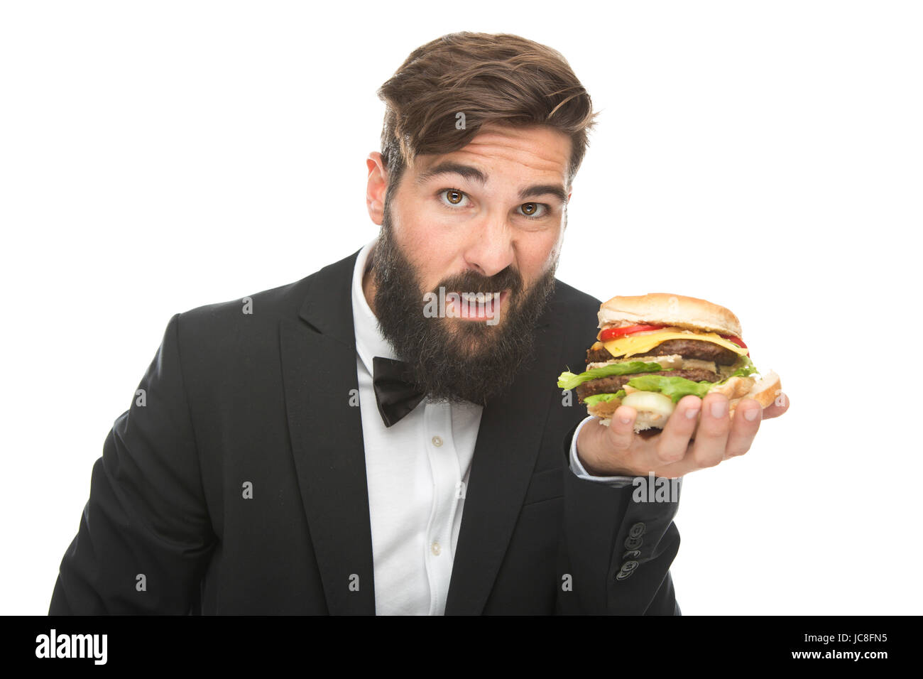 man with burger in hand Stock Photo - Alamy