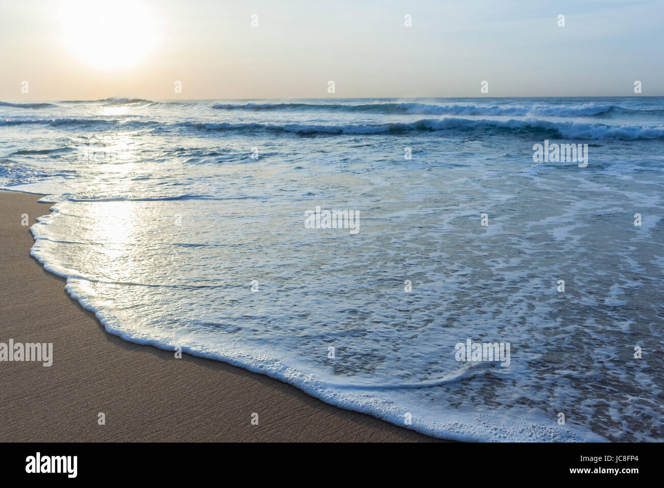 Beach morning wave wash up sand shoreline nature water detail contrasts ...