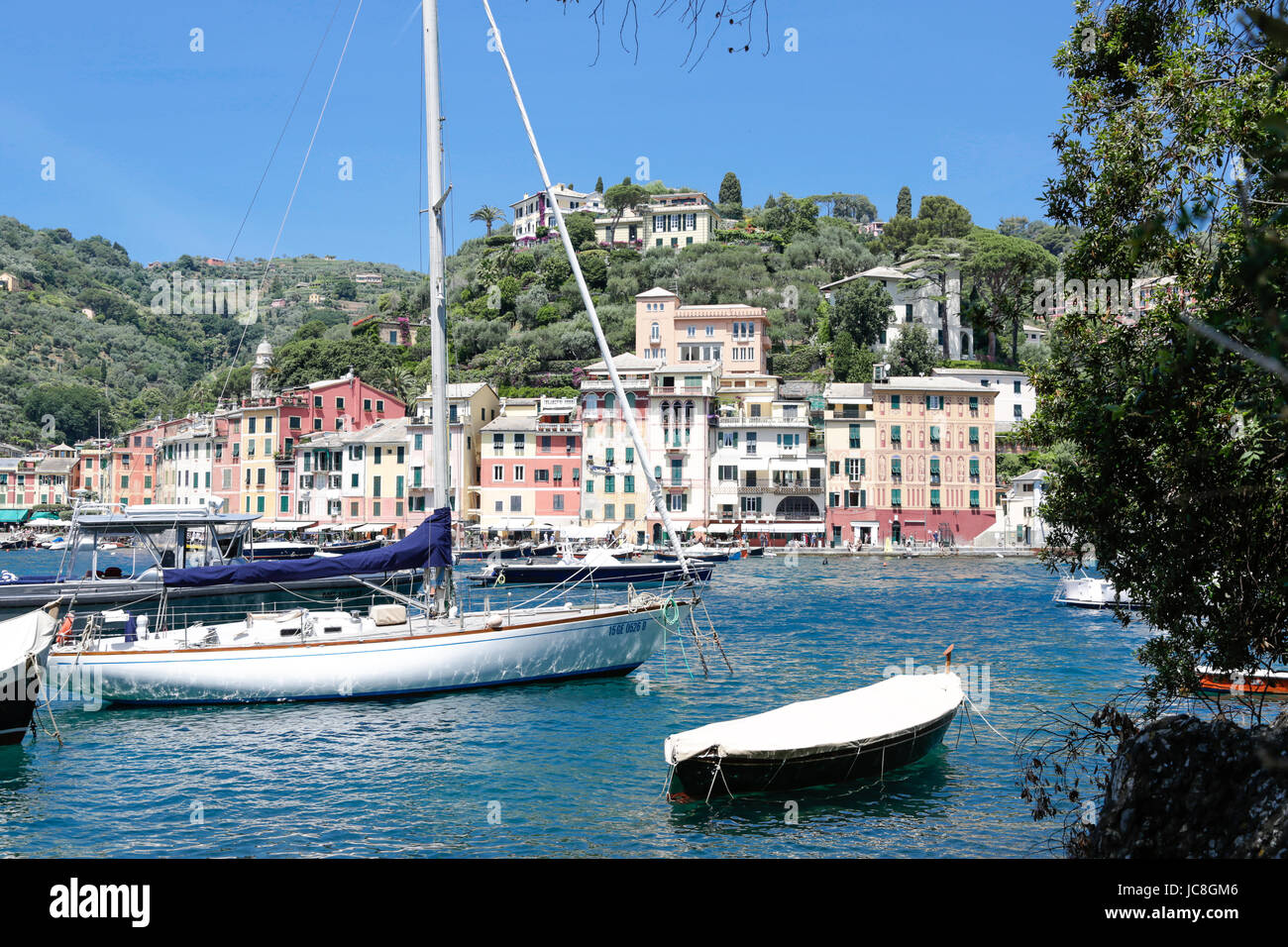 Portofino harbor with colorful and historical houses in the background ...