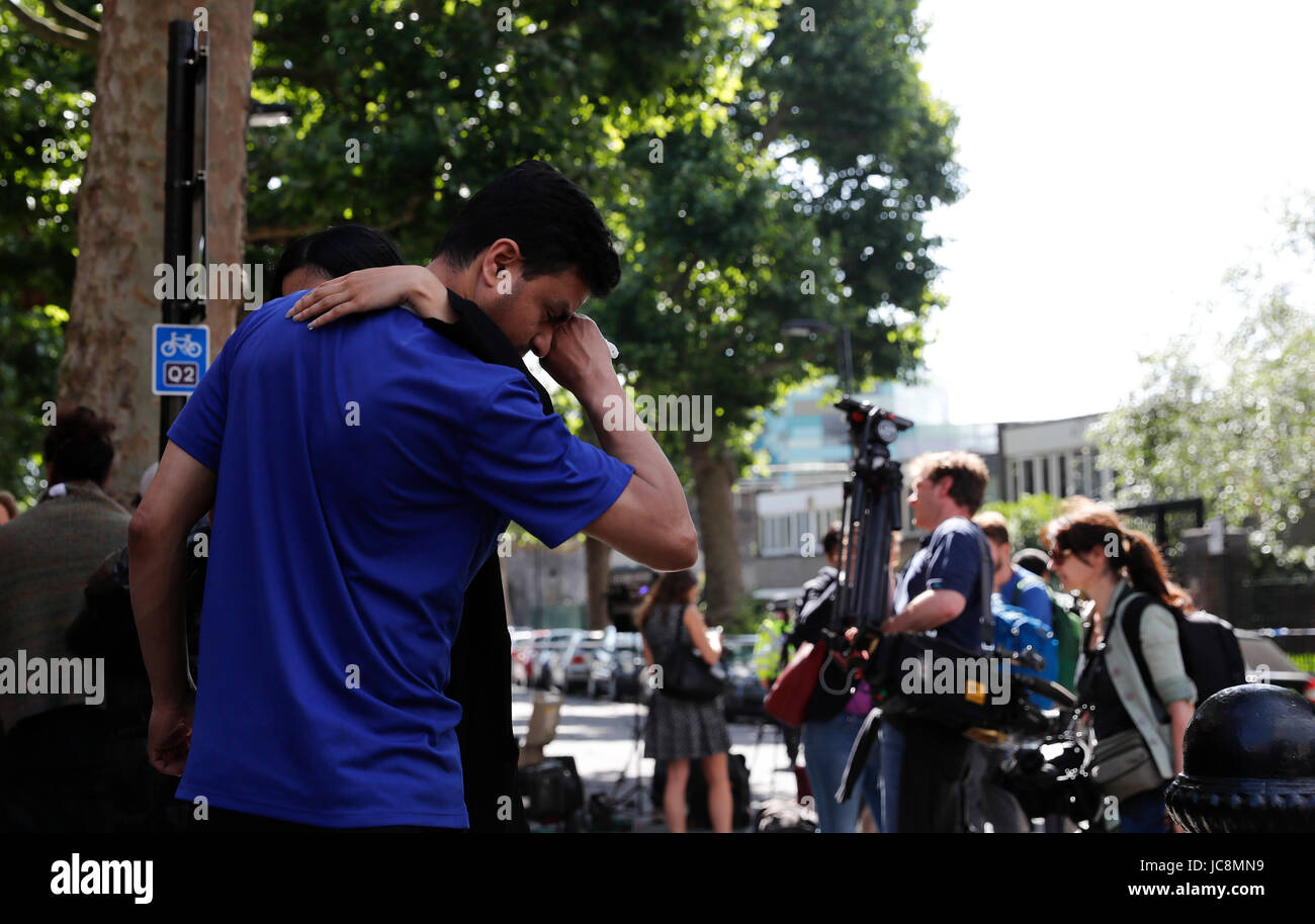 Police hug hi-res stock photography and images - Alamy