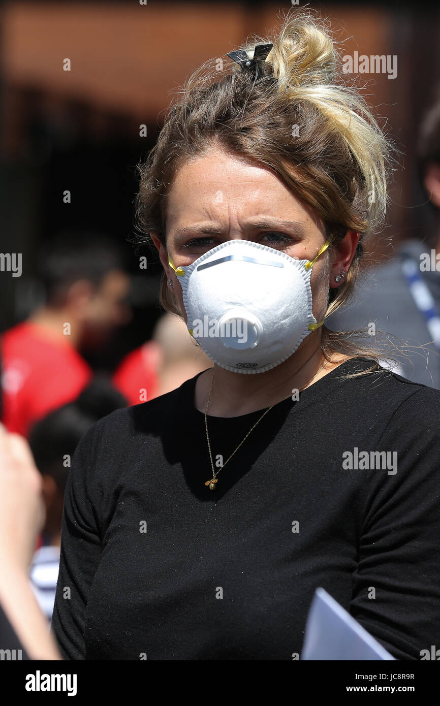 Woman wearing a ripped face mask hi-res stock photography and images ...