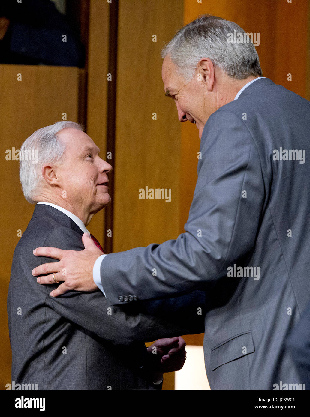 United States Attorney General Jeff Sessions, left, shakes hands with ...
