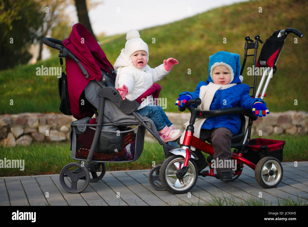 boy and girl met in strollers Stock Photo - Alamy