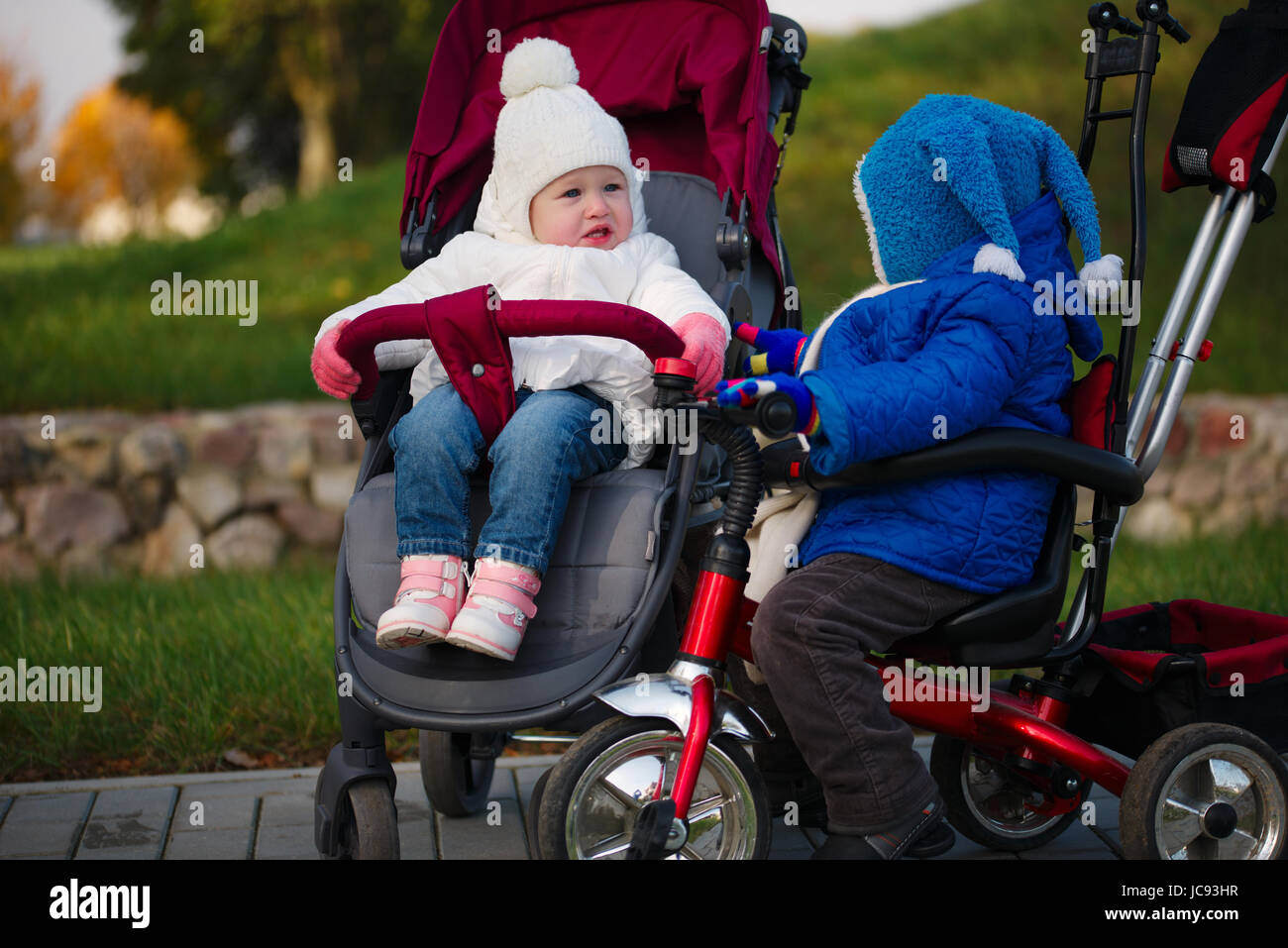 boy and girl met in strollers Stock Photo - Alamy