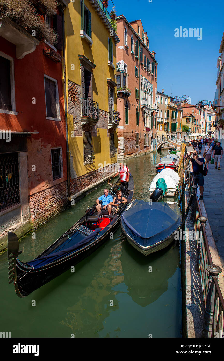 Romantic gondola ride on the canals of Venice, Italy. Picture by Paul ...