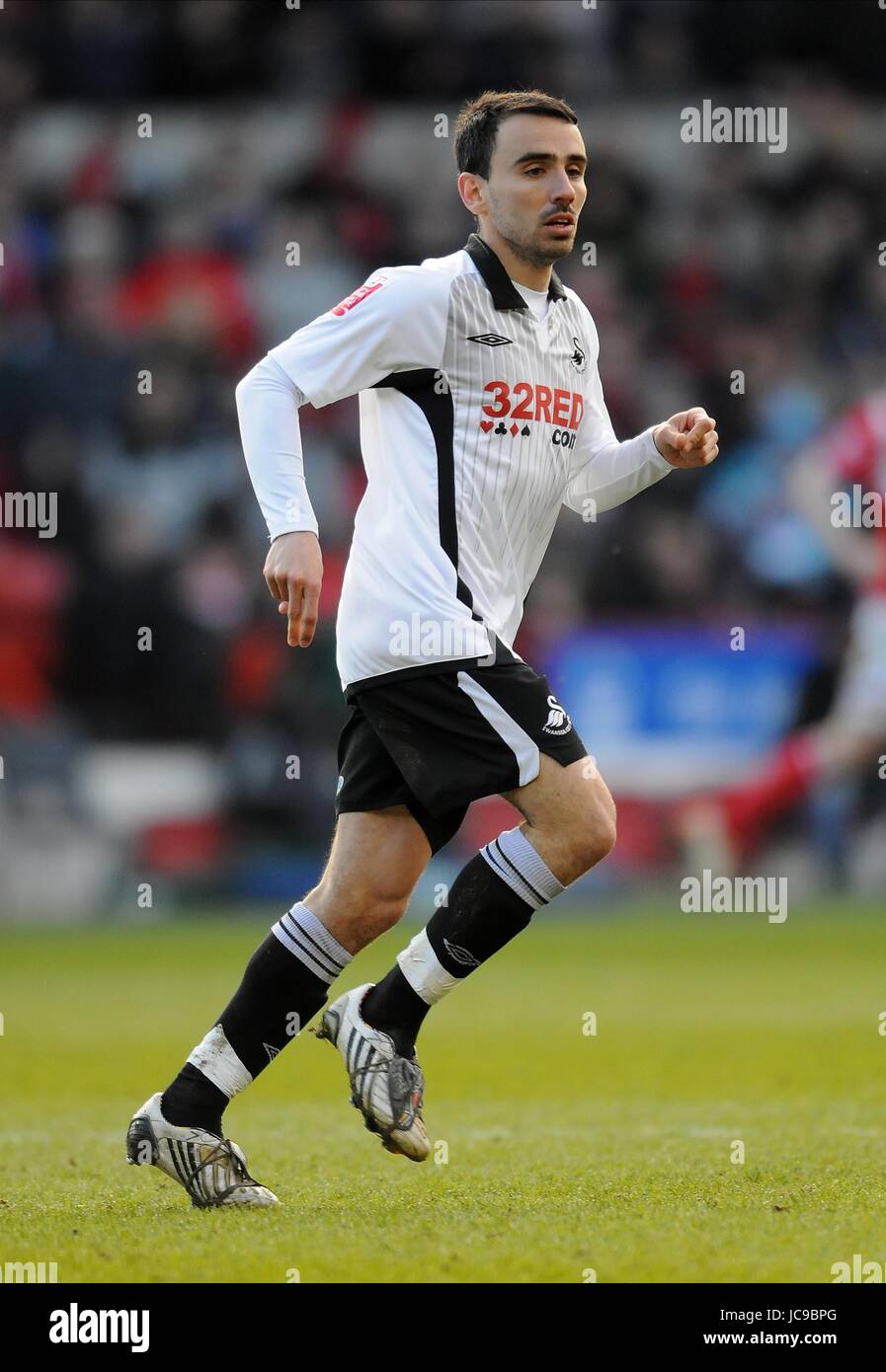 LEON BRITTON SWANSEA CITY FC TRENT BRIDGE NOTTINGHAM ENGLAND 06 March ...