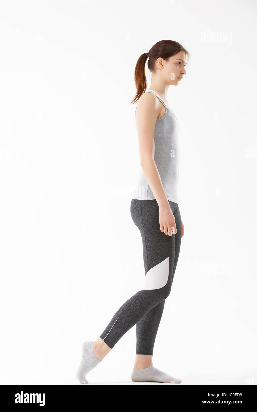 Young woman exercise yoga supported headstand Stock Photo - Alamy