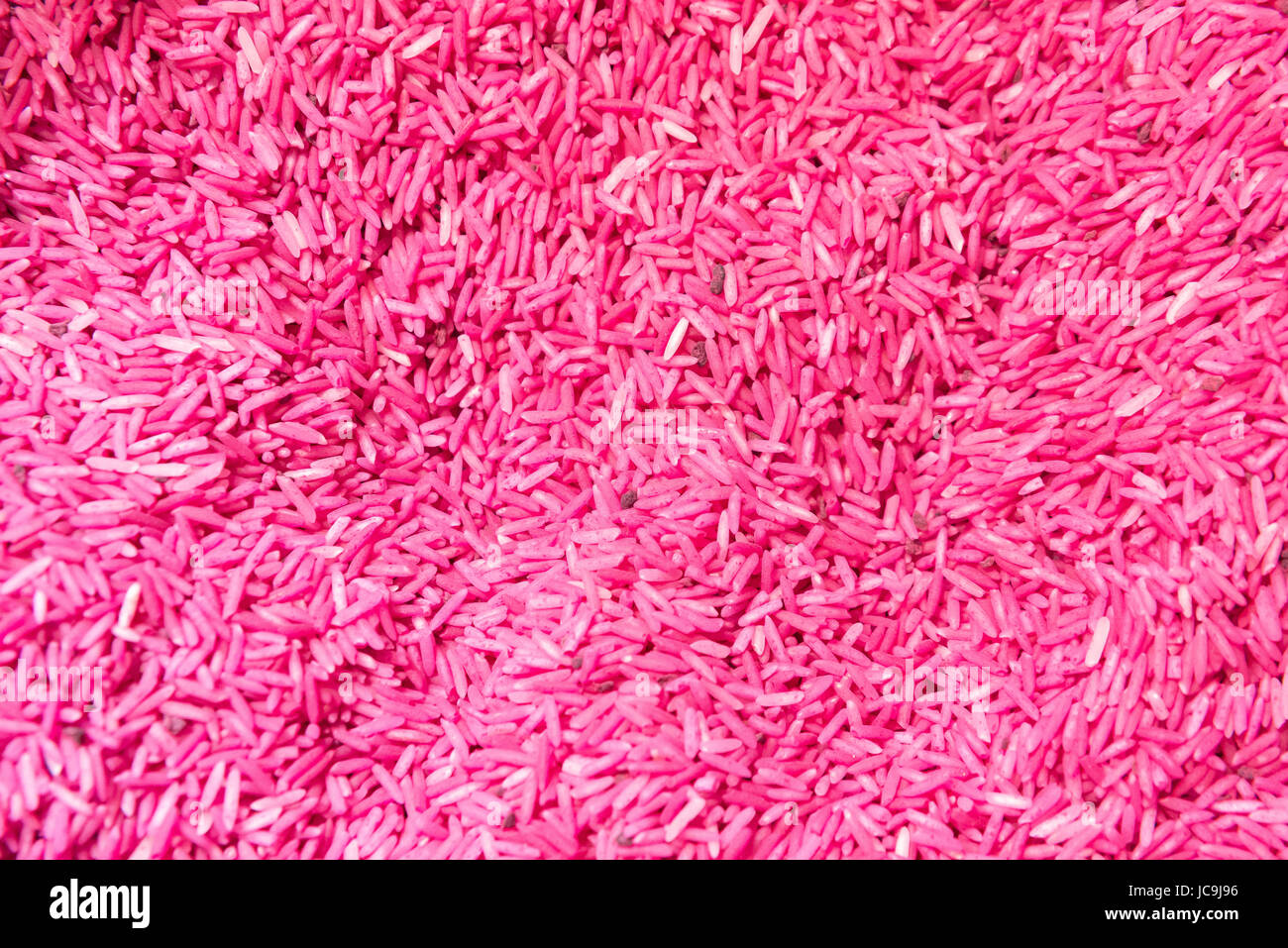 Raw pink Rice, background and texture of pink rice Stock Photo - Alamy