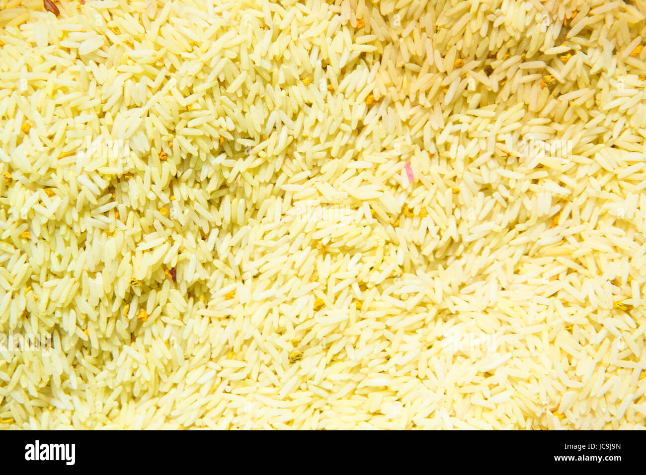 curcuma indian Rice, background and texture of rice Stock Photo - Alamy