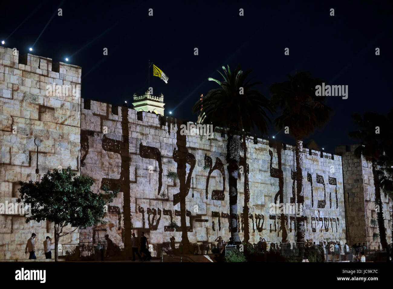 The words Western Wall in Hebrew are projected on the walls of the Old ...