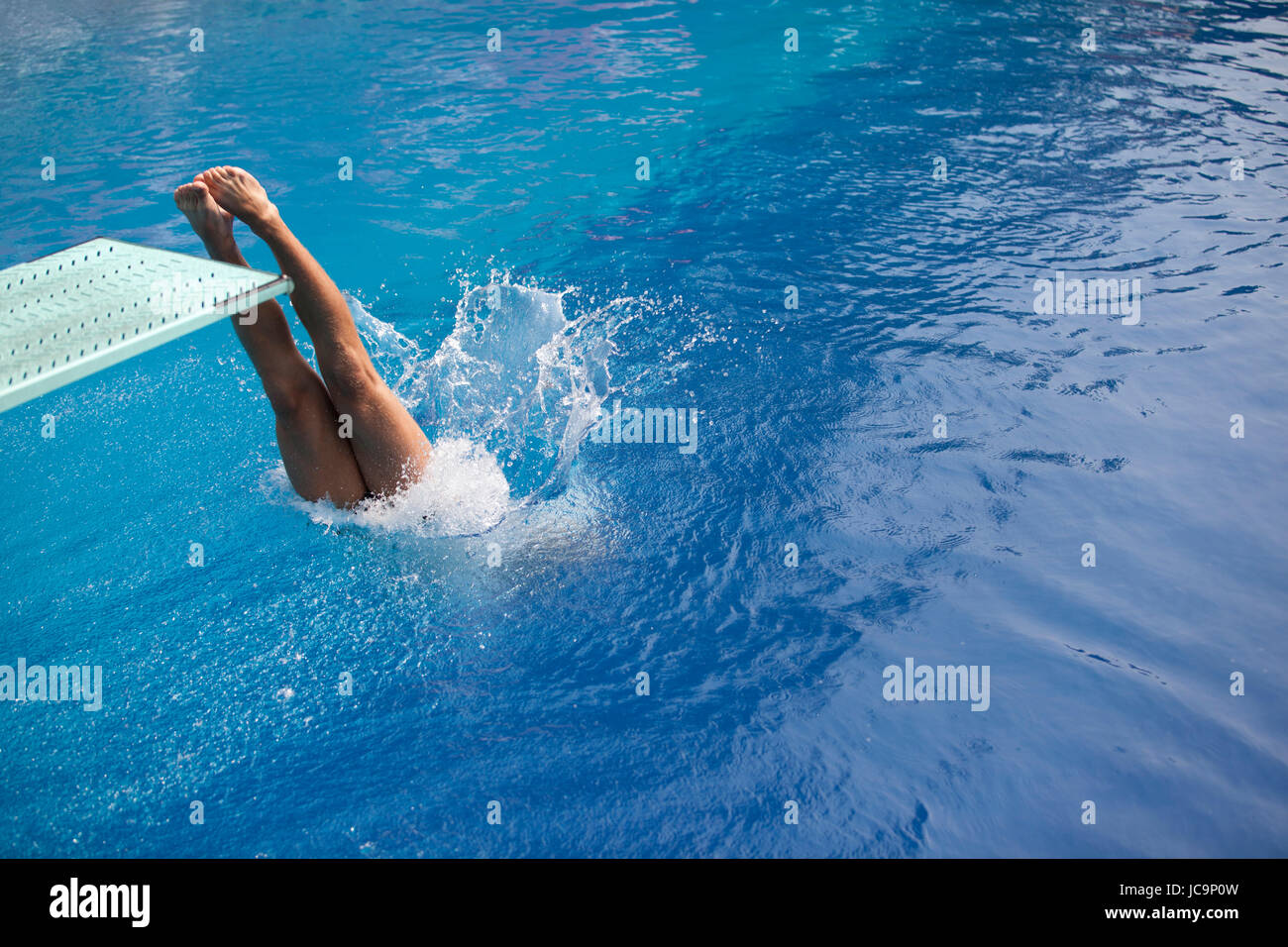swimmer diving into a pool Stock Photo - Alamy