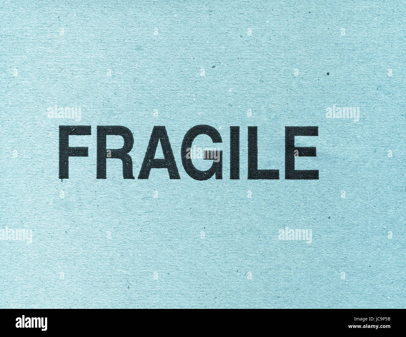 Fragile written on a corrugated cardboard packet - cool cyanotype Stock ...