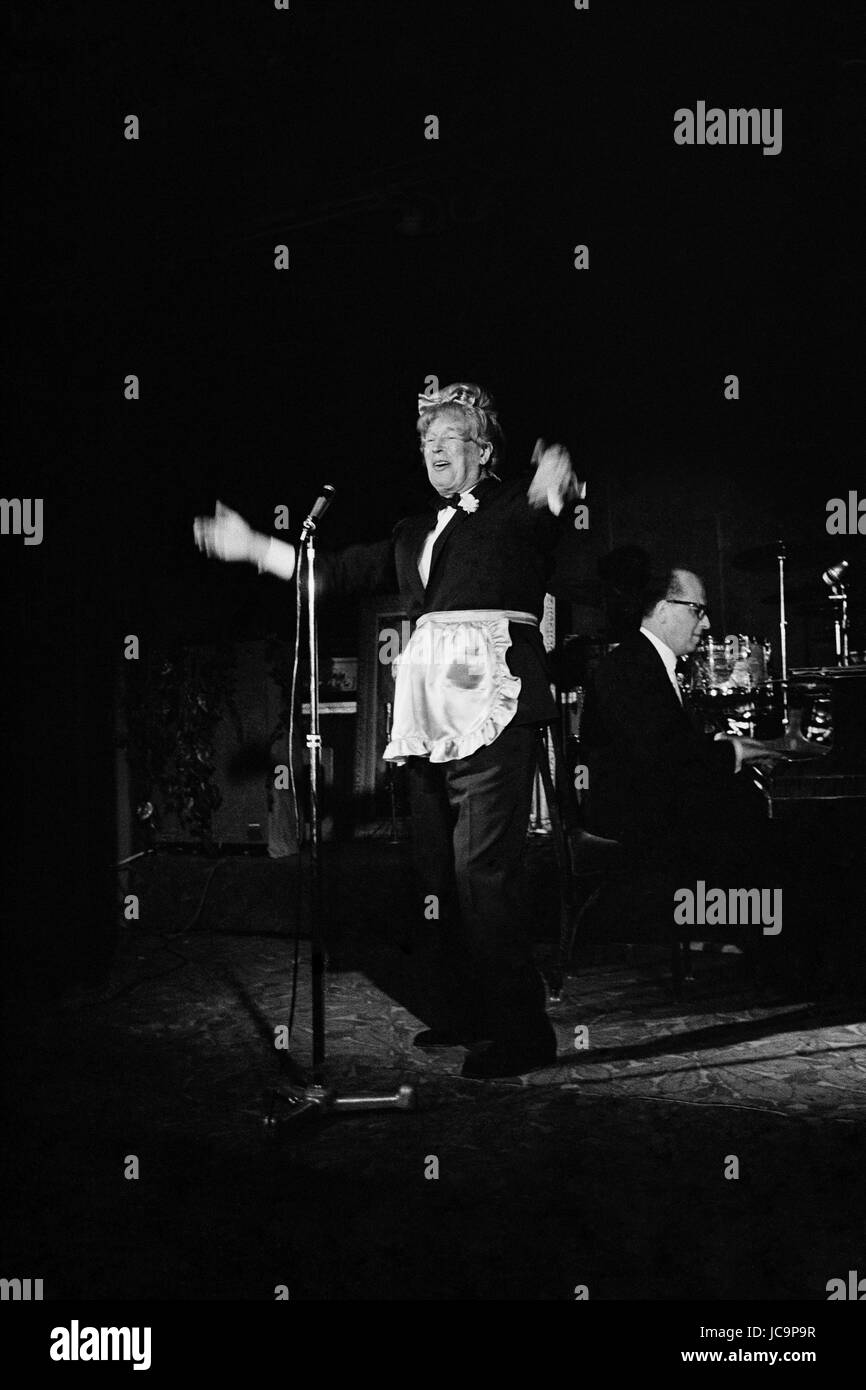 French singer Maurice Chevalier on the stage of the restaurant Maxim's ...