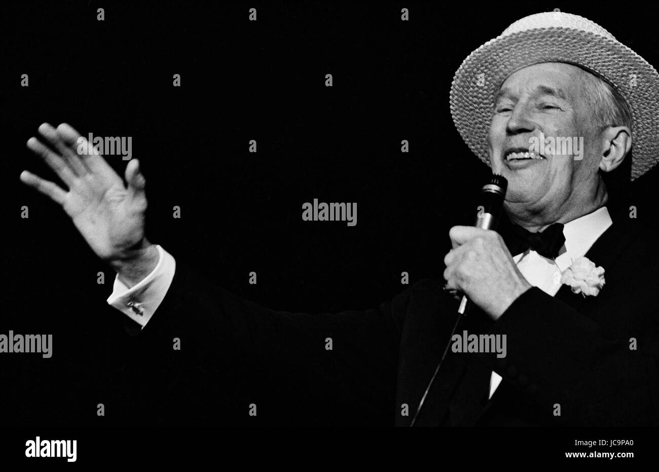 French singer Maurice Chevalier on the stage of the restaurant Maxim's ...
